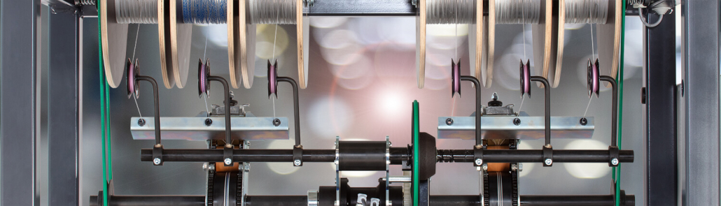 Textile braiding machines for round and flat braids | HERZOG